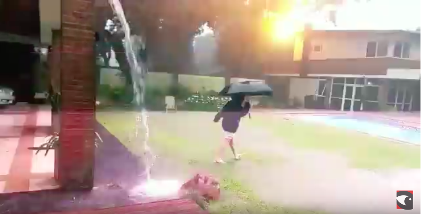 Mom Films Son Playing in Rain as Lightning Strikes | NTD