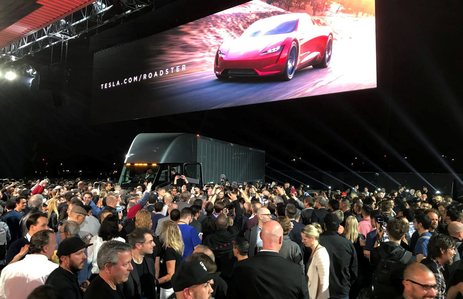New $200,000 Tesla Roadster Speeds in Front of Electric Big-Rig Truck | NTD