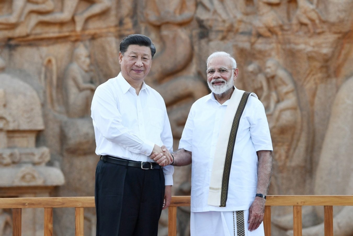 China's Xi Lands in India Amid Scattered Tibetan Protests | NTD