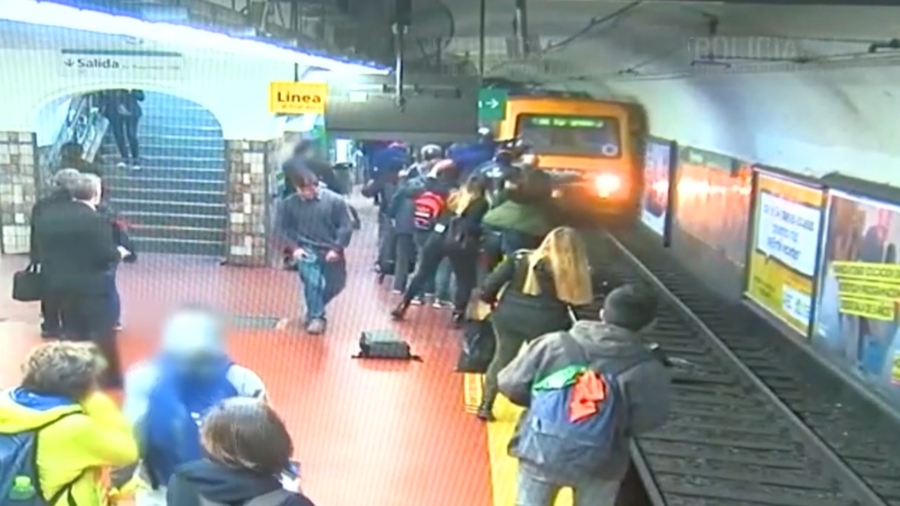Woman Falls Onto Train Tracks and Survives | NTD