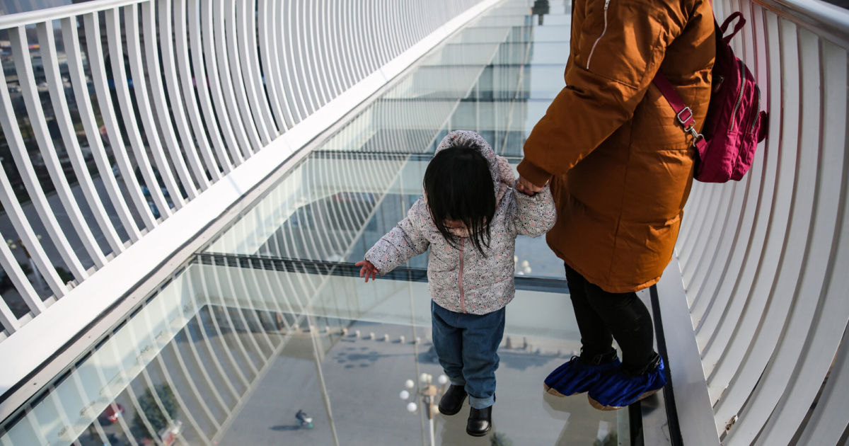 Wind Shatters Glass Bridge in China, Man Stranded | NTD