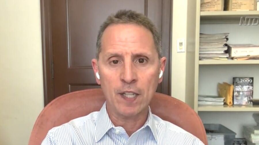 Analyst: Fed May Overdo Rate Hikes | NTD