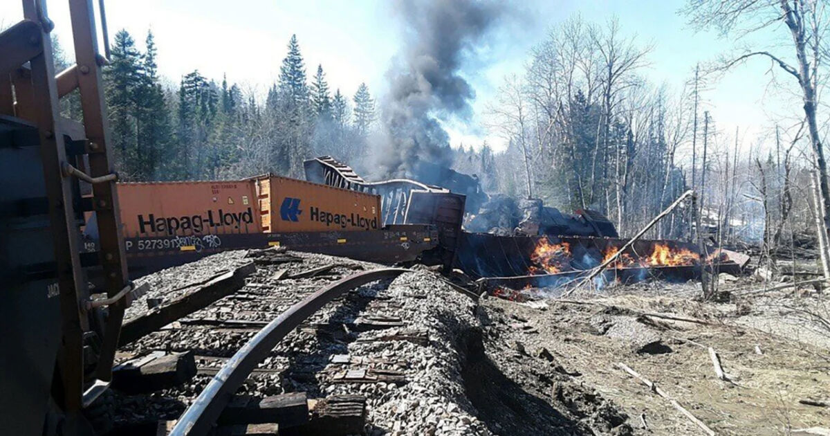 Freight Train Engines, Cars Derail and Catch Fire in Maine | NTD