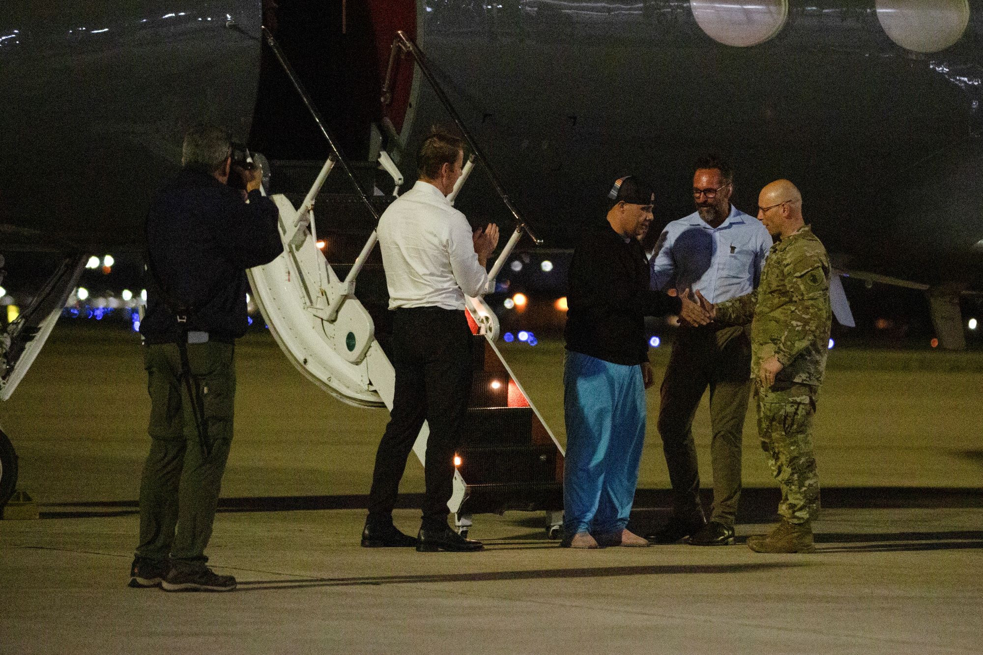 Americans Freed by Venezuela in US Prisoner Swap Land at Texas Base | NTD Americans Freed by Venezuela in US Prisoner Swap Land at Texas Base | NTD