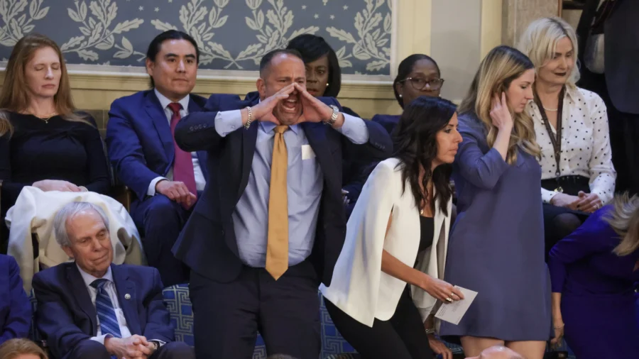 Father of Slain Marine Arrested for Yelling During Biden's SOTU Address ...