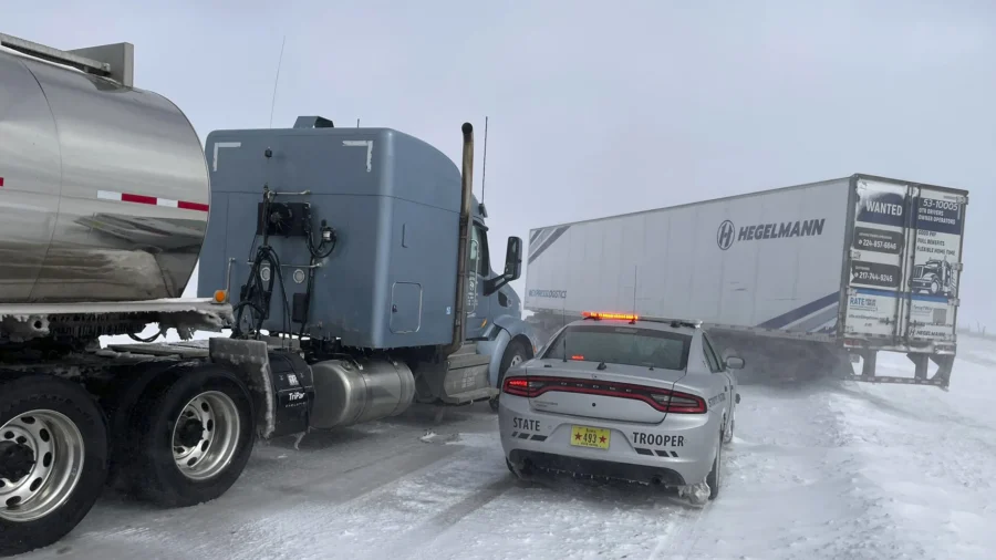 Powerful US Storms Create Blizzard Conditions and Threaten to Spawn ...