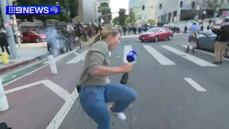 Australian Reporter Hit With Projectile During LA Riot | NTD