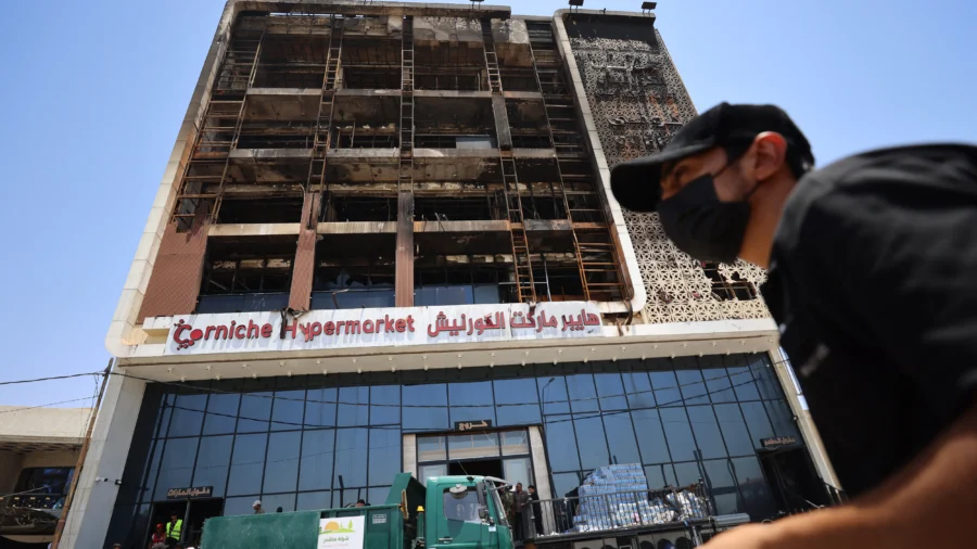 Fire Kills Dozens at Iraqi Supermarket | NTD